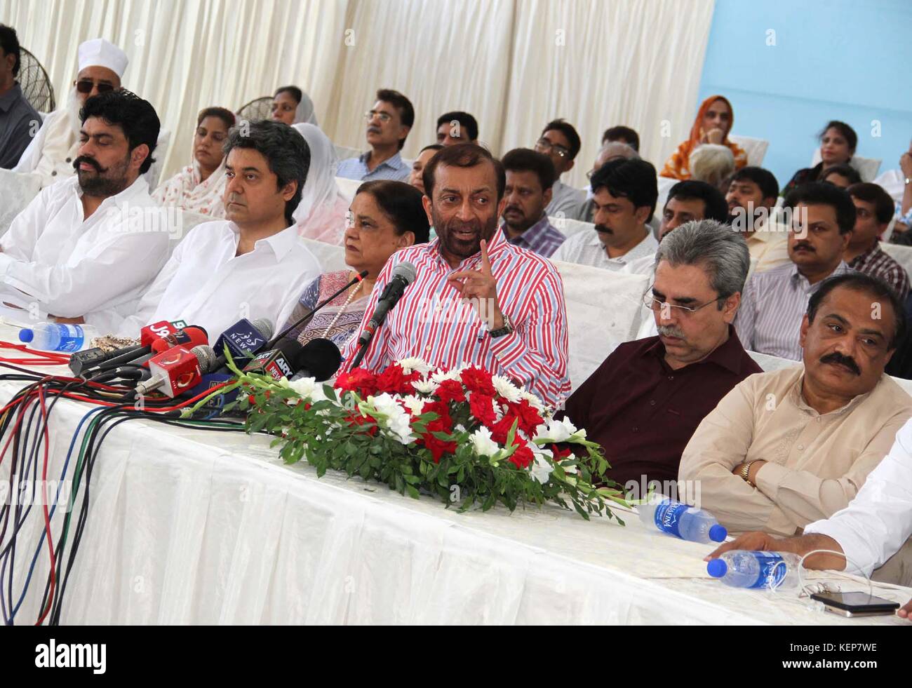 Chief of MQM-Pak Dr. Farooq Sattar addressing to media persons during a ...