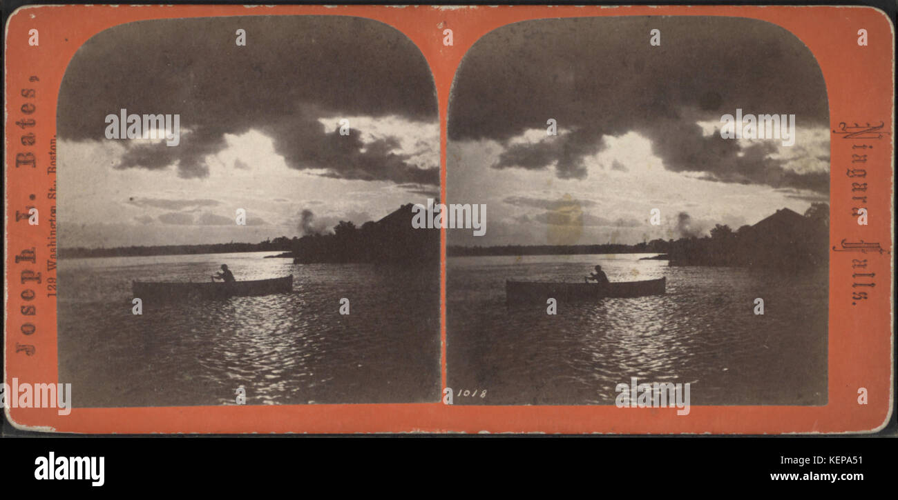 A stereoscopic view of Niagara Falls at sunset, featuring a man boating ...