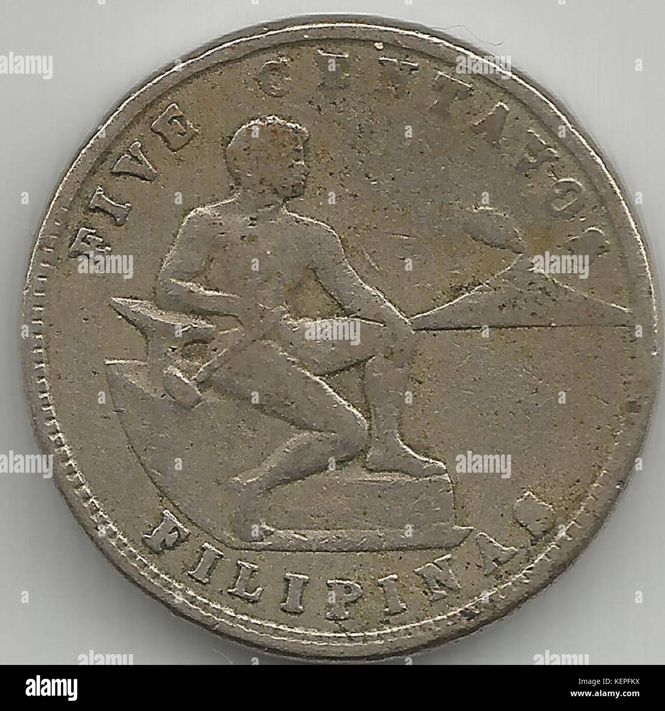 This image shows the obverse of a 5 centavos coin from the Philippines ...