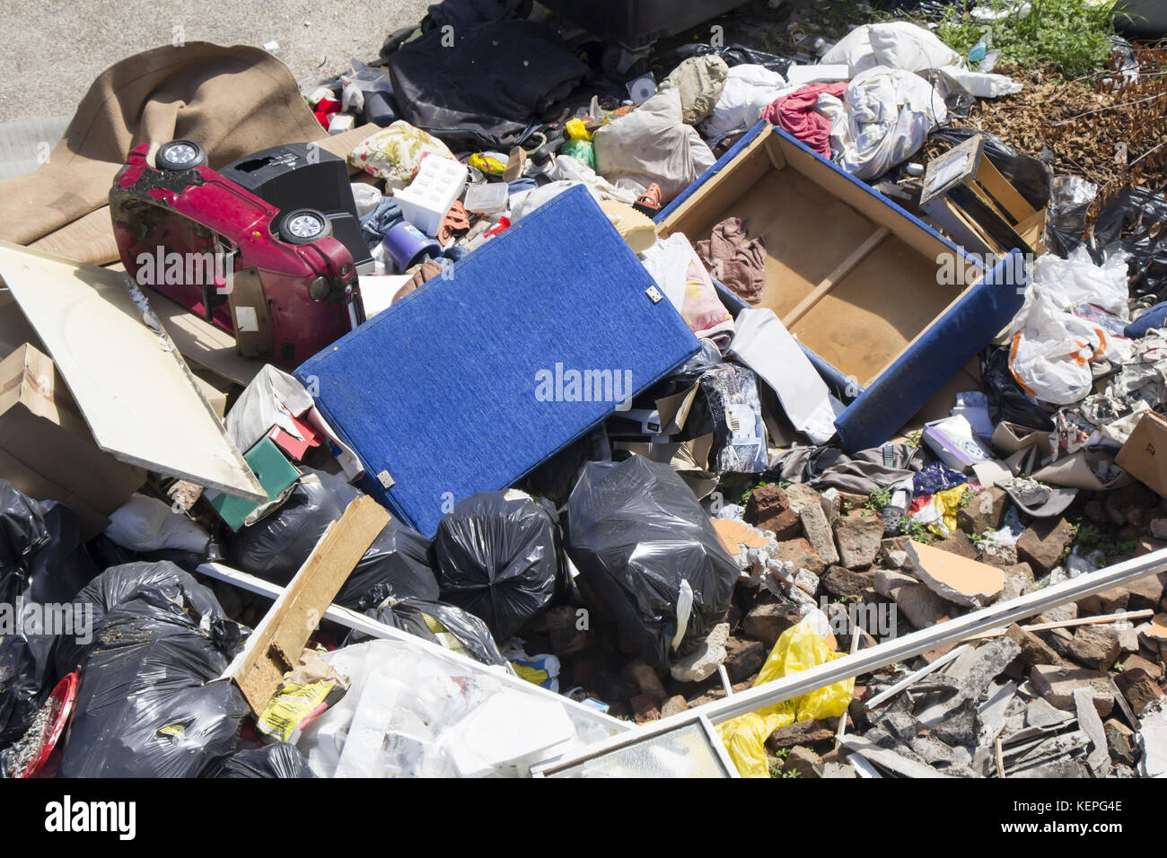Various household waste and garbage thrown away on the street Stock ...