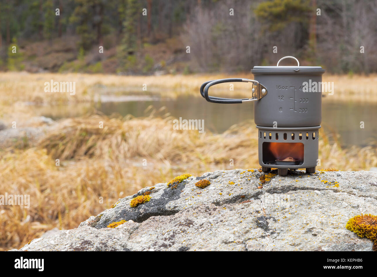Cooking at a camp site Stock Photo - Alamy