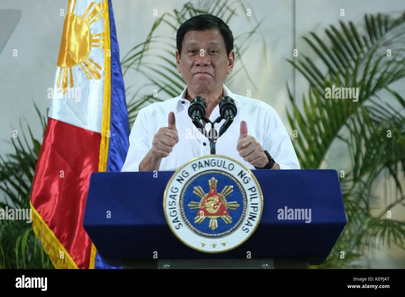 President Rodrigo Duterte gives a thumbs up during a press conference ...