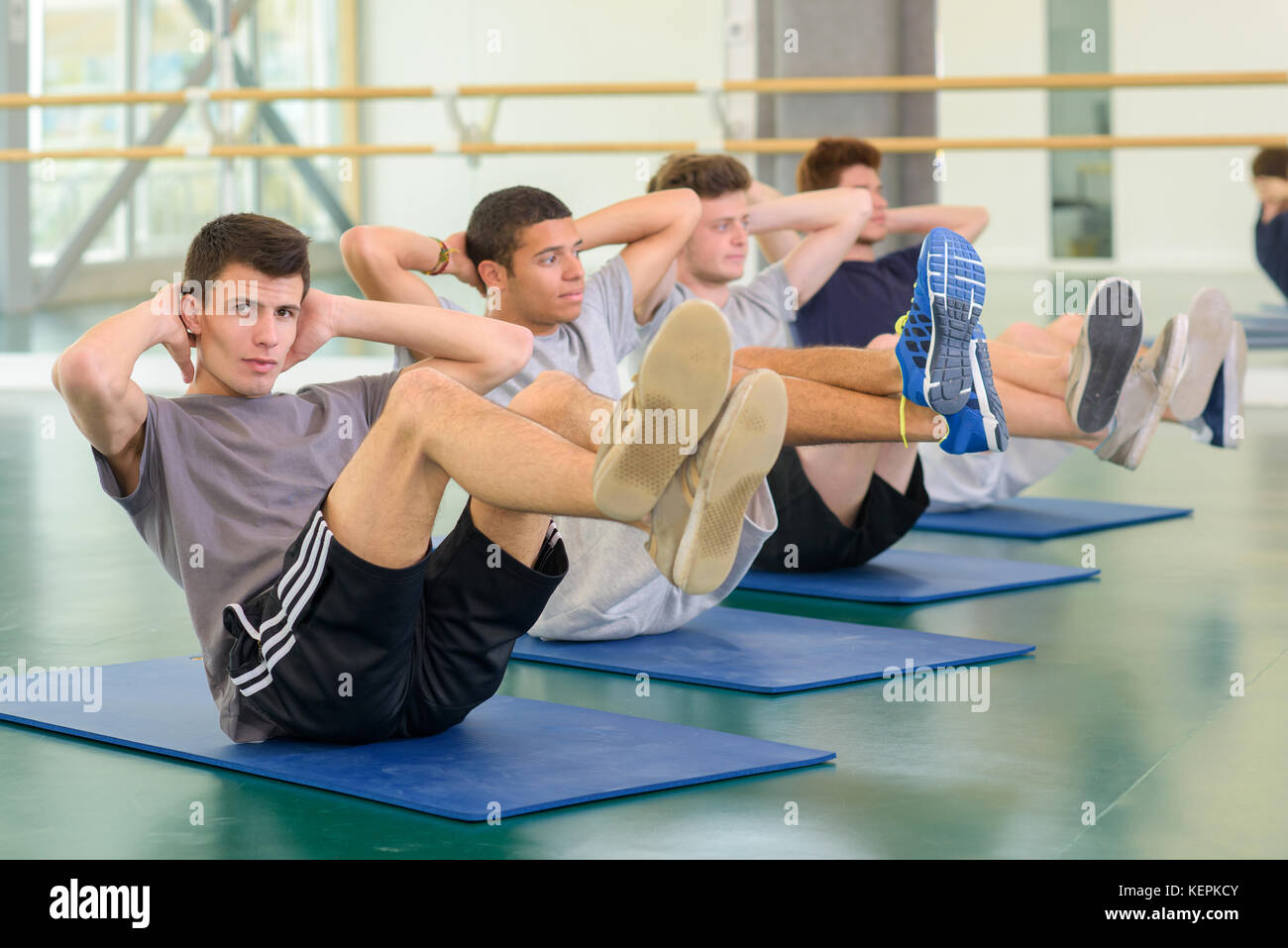 men on their mats Stock Photo - Alamy