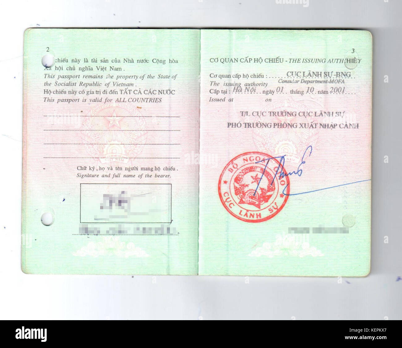 Vietnamese official passport page 2 3 issued 2001 Stock Photo - Alamy