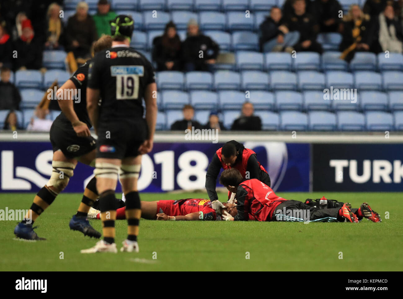 Harlequins' Francis Saili is treated for a serious injury during the ...