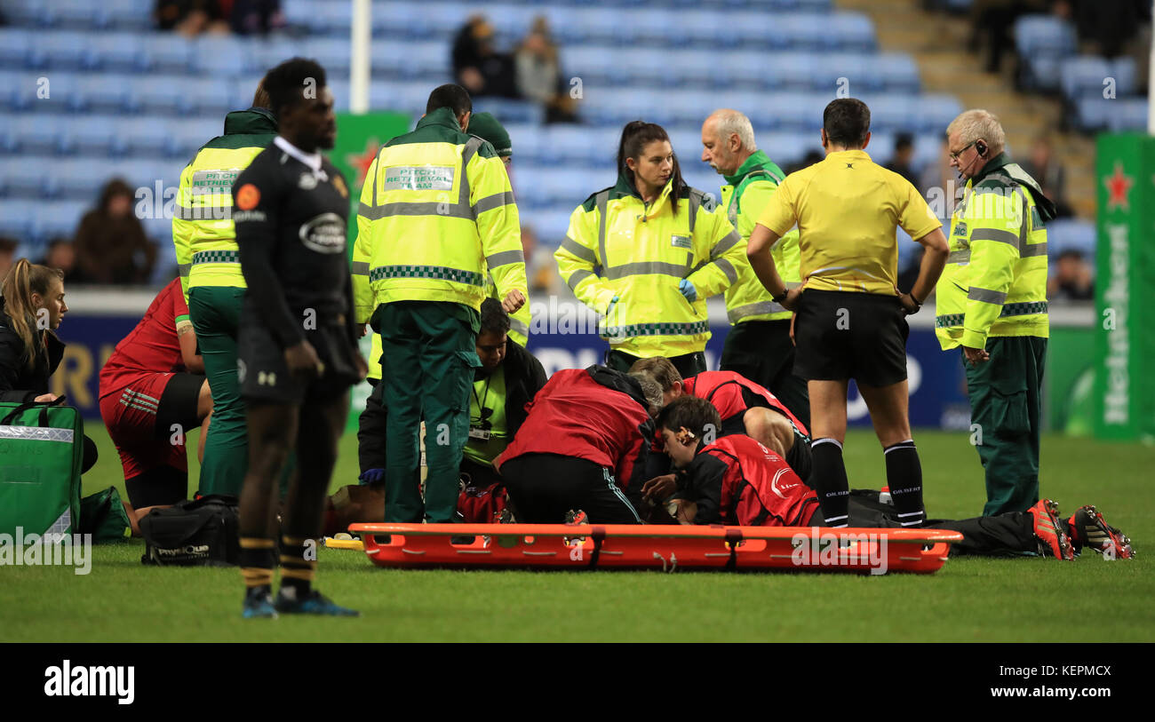 Harlequins' Francis Saili is treated for a serious injury during the ...