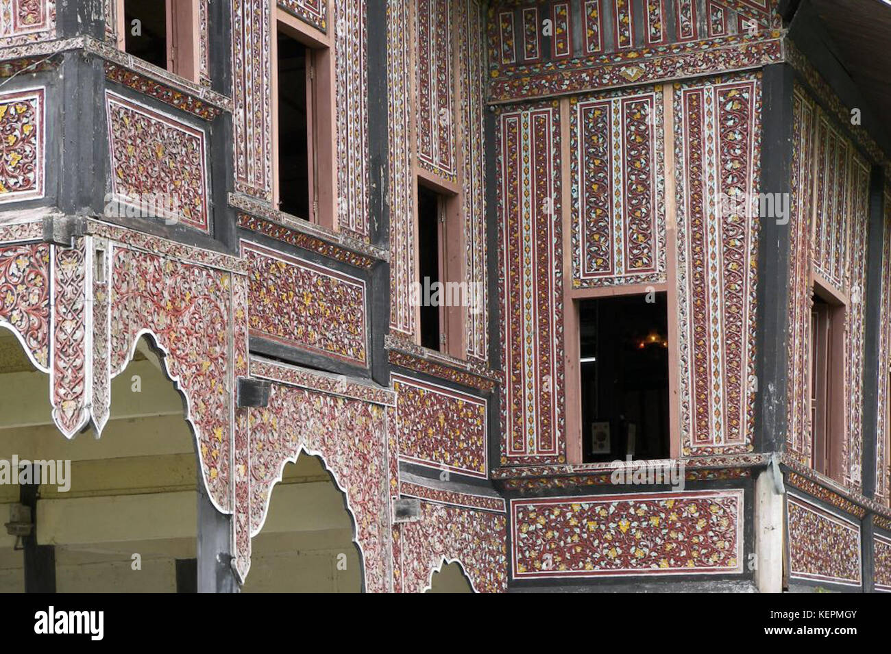 A detailed study of Minang carvings, focusing on the intricate and ...