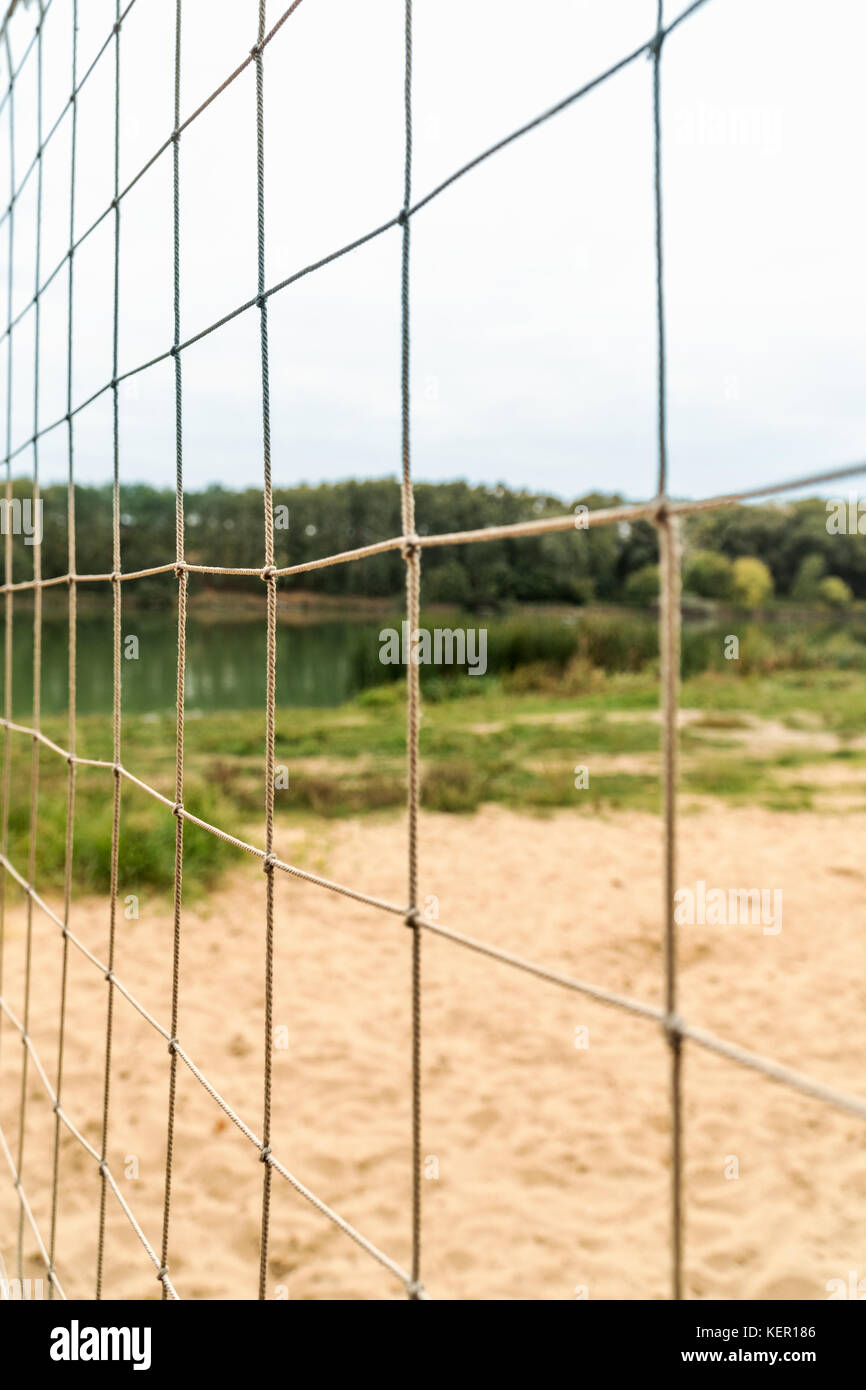 Beach volleyball net with nature on the background Stock Photo - Alamy
