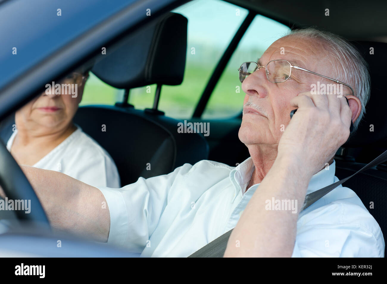 senior man driver calling at the same time Stock Photo - Alamy