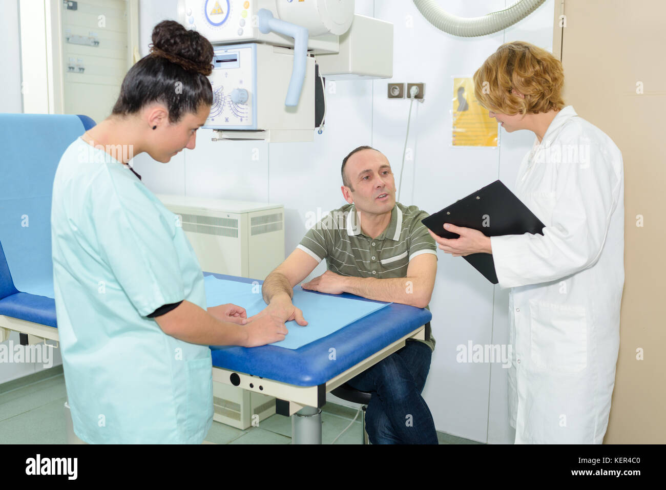 medical team with patient at th hospital Stock Photo - Alamy