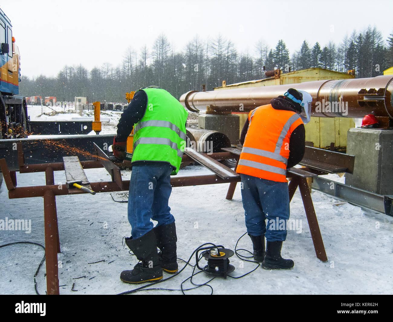 Safety at work. Welding and grinding of iron constructions. Industrial ...