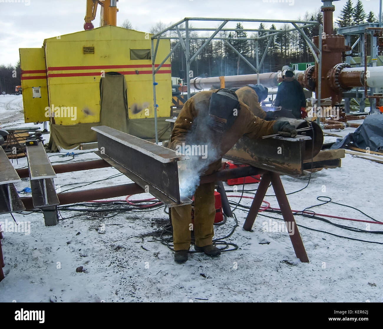 Safety at work. Welding and grinding of iron constructions. Industrial ...