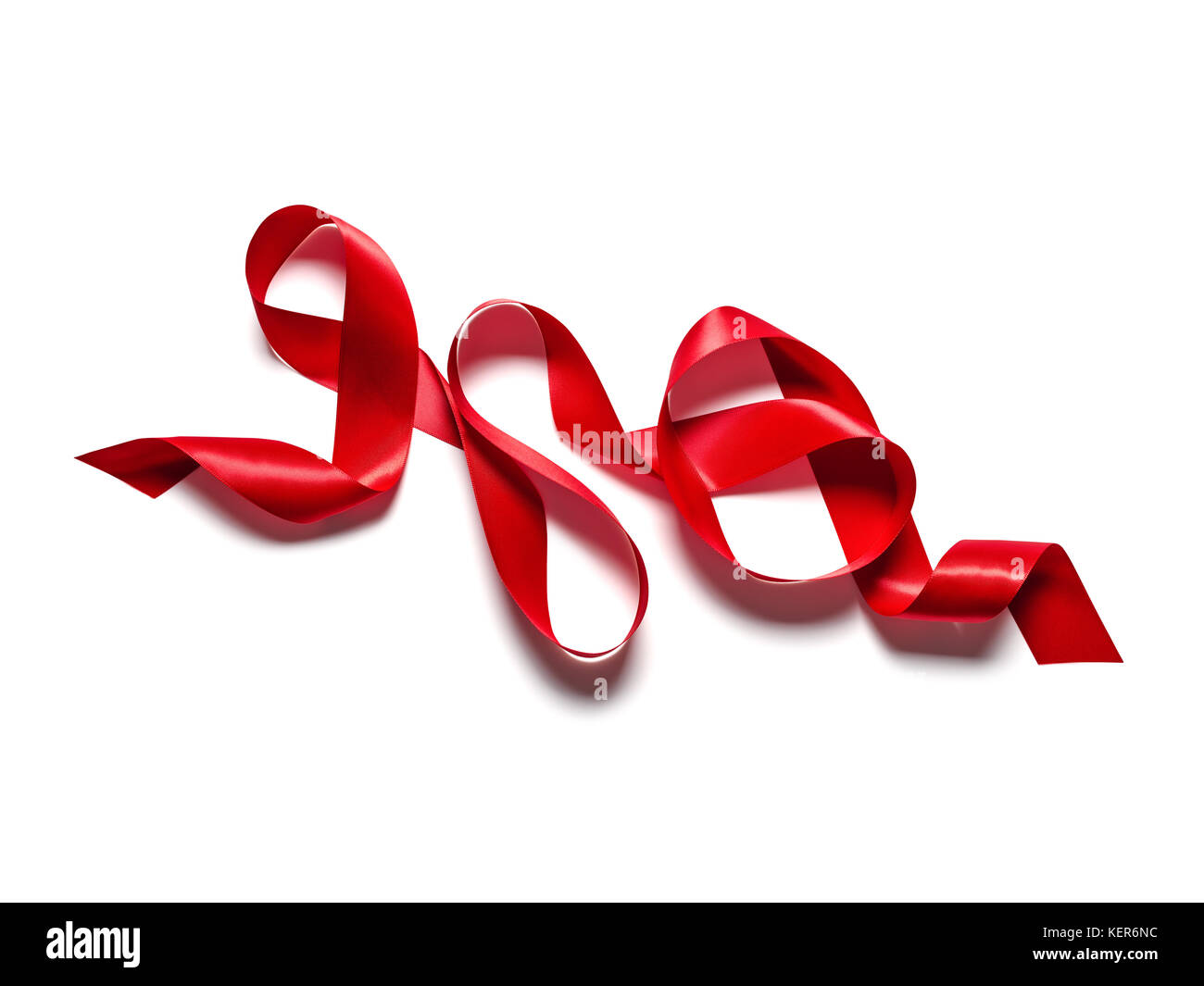 Red silk or satin ribbon abstraction isolated on white background Stock ...