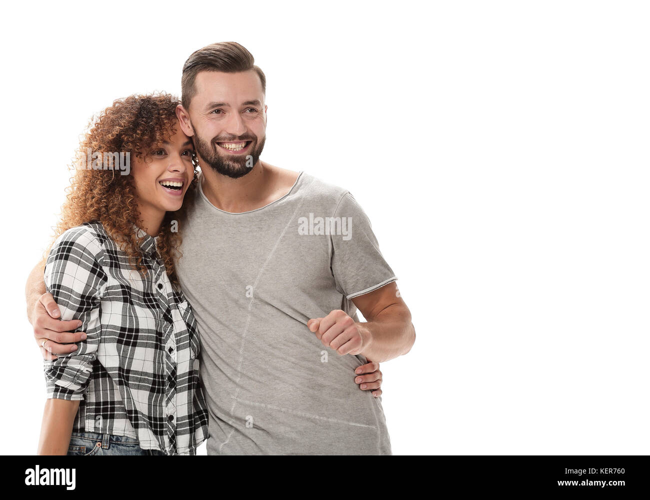 young couple discussing their dreams and pointing forward. photo has a ...