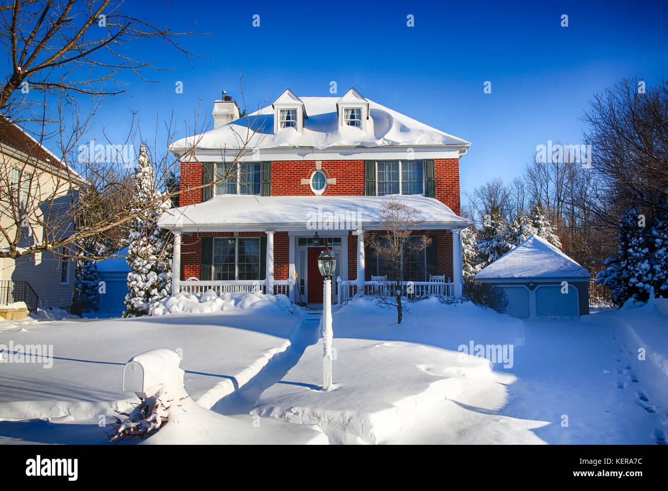 A colonial home in southern New Jersey covered in fresh snow Stock ...