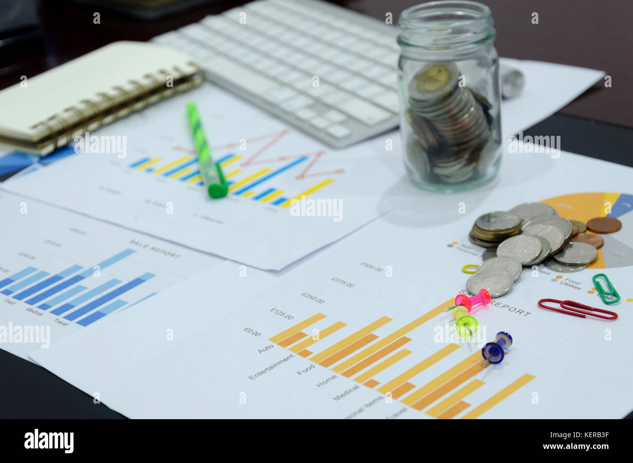 business documents graph and chart on desk Stock Photo - Alamy