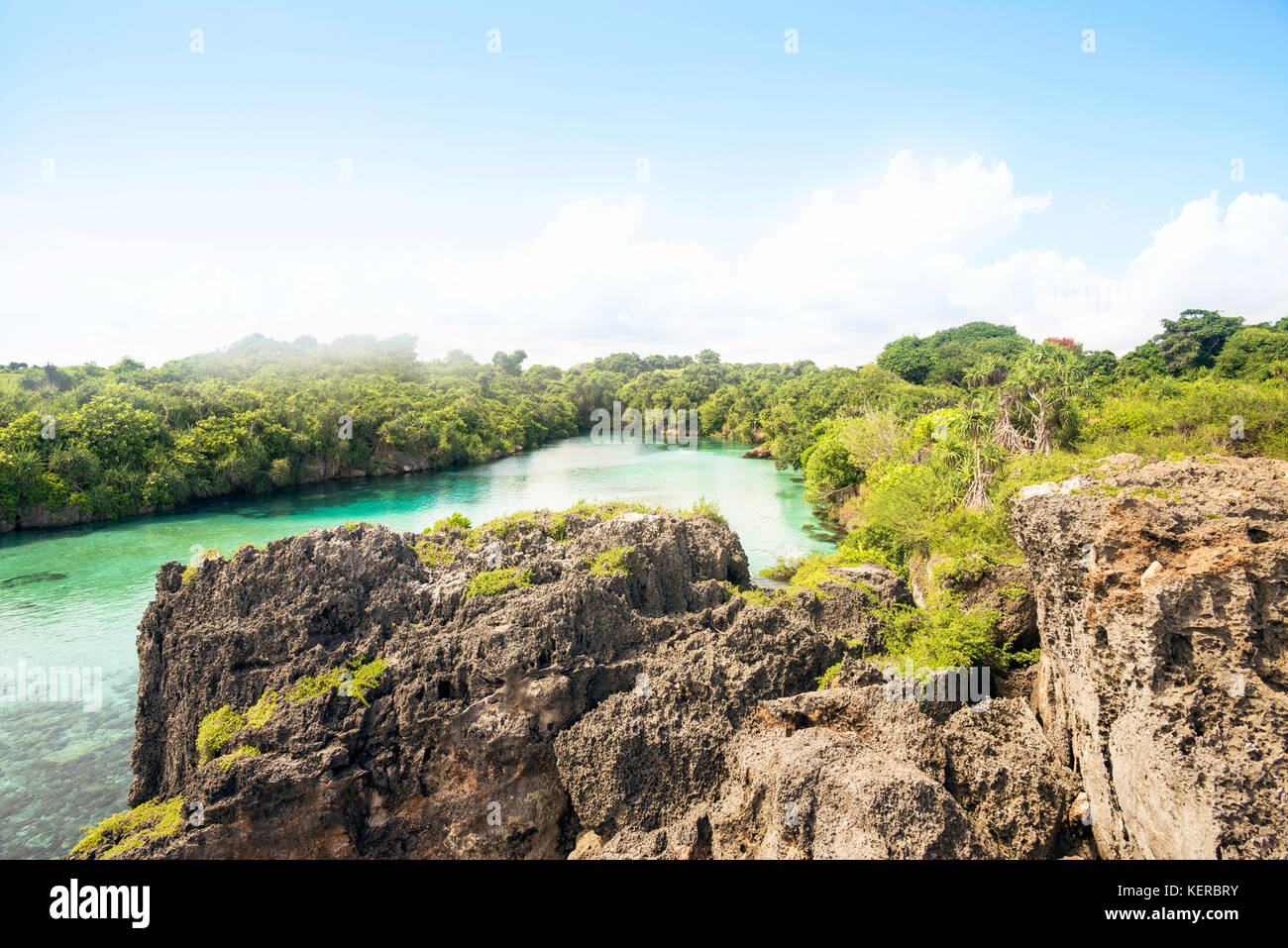 Scenery of natural lake with surrounded by cliffs on Weekuri, Sumba ...