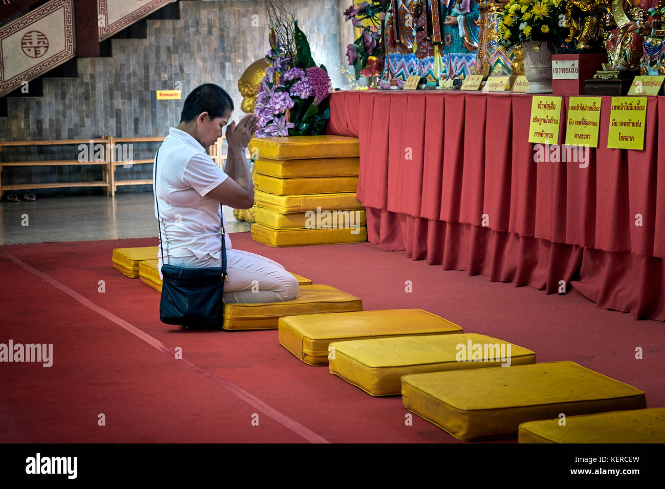 Woman praying kneeling. Thailand temple, people, prayer, Southeast Asia ...