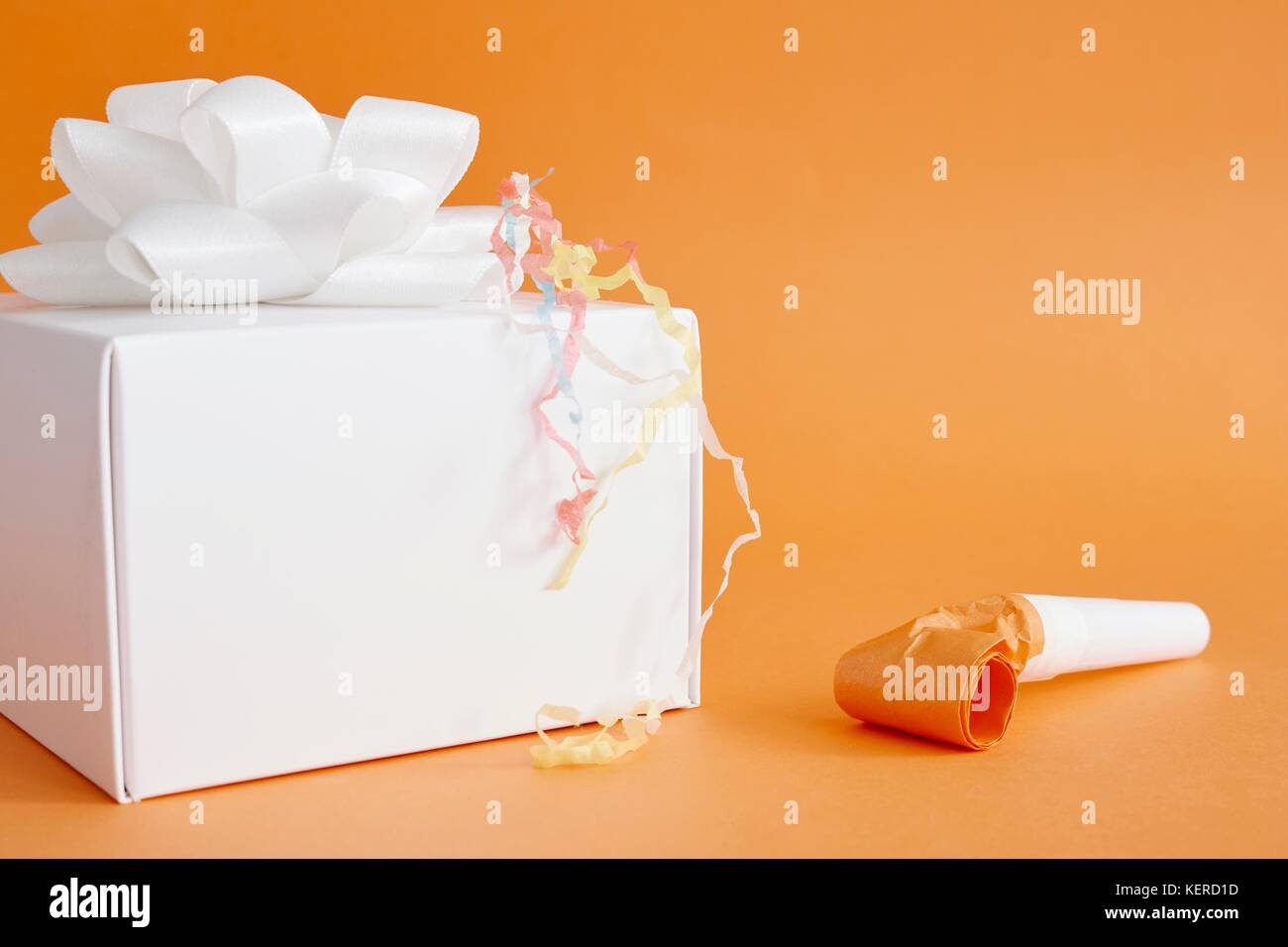 A studio photo of a gift wrapped present Stock Photo - Alamy