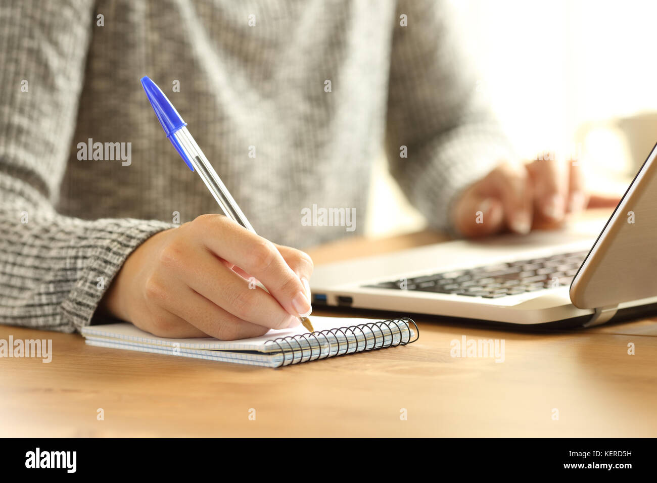 Woman writing letter laptop hi-res stock photography and images - Alamy