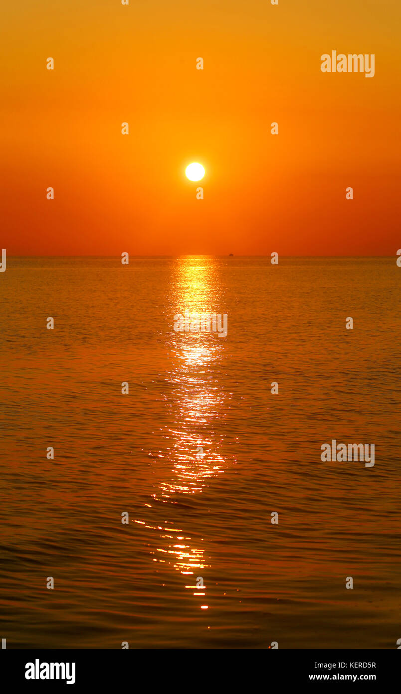 Photo of a bright sea sunset Stock Photo - Alamy