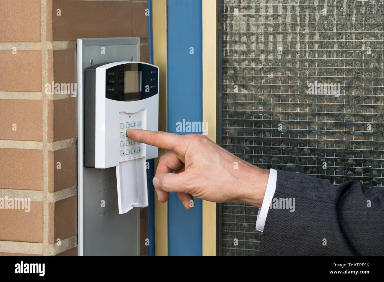 Close-up Of Businessperson Hand Entering Code In Security System Stock ...