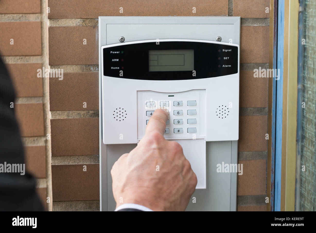 Close-up Of Businessperson Hand Entering Code In Security System Stock ...