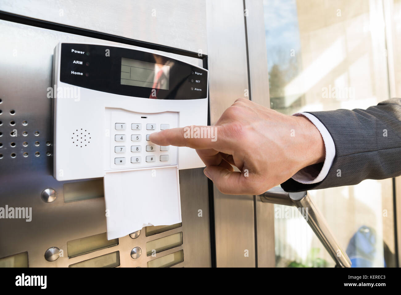 Close-up Of Businessperson Hand Entering Code In Security System Stock ...