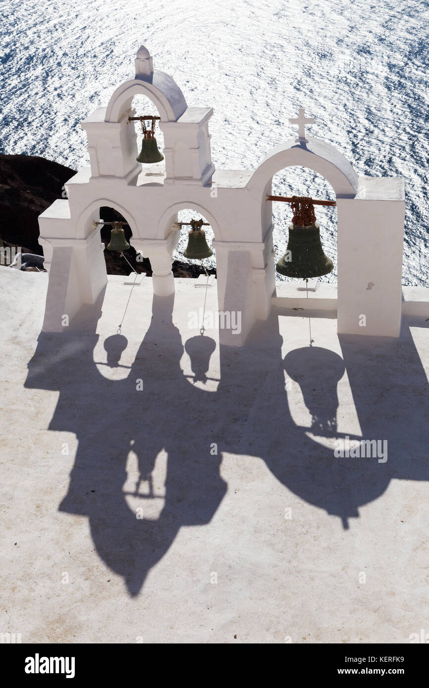 Traditional bell tower in Oia village of Cyclades Island, Santorini ...