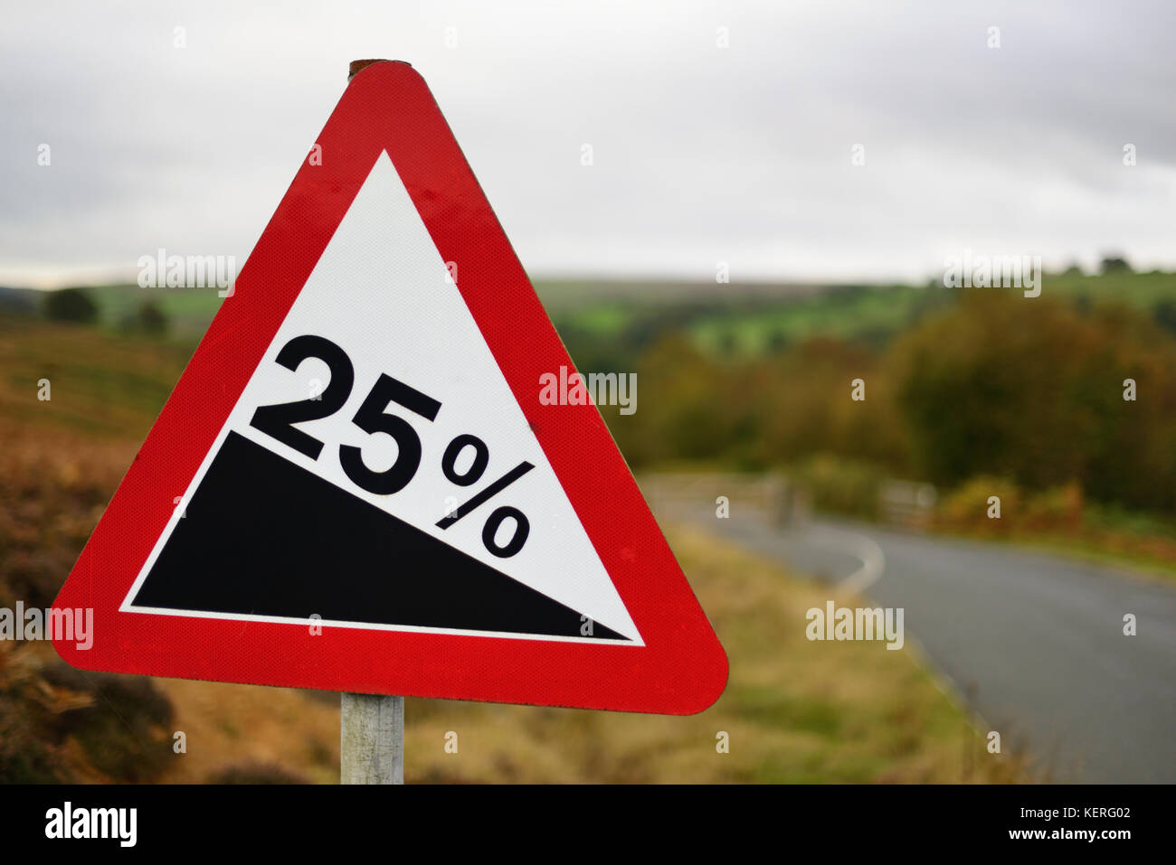 Road sign warning motorists approaching a 25% gradient Stock Photo - Alamy