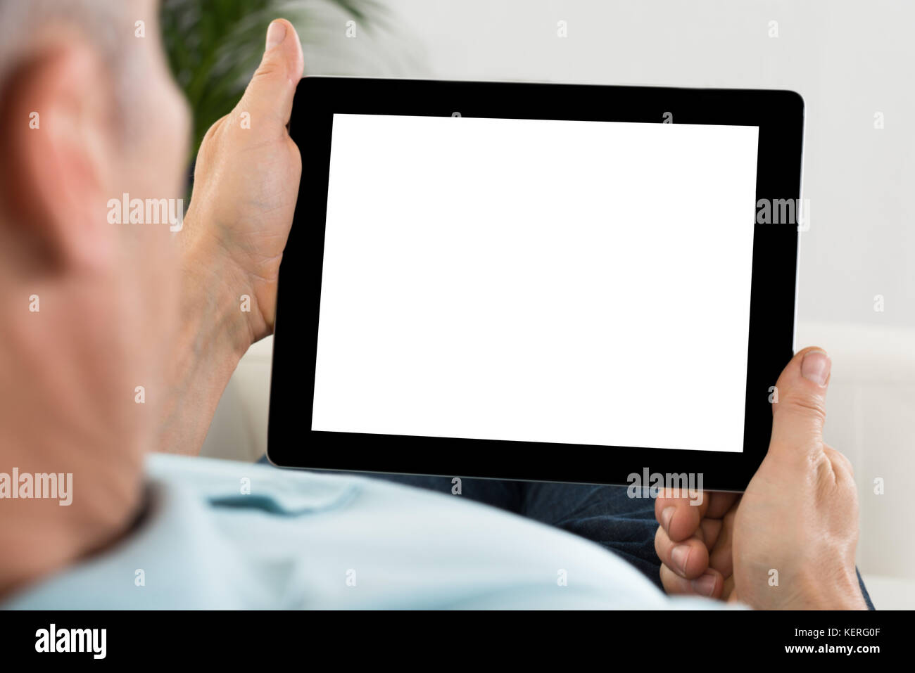 Close-up Of Person Hand Holding Tablet With Blank Screen Stock Photo ...