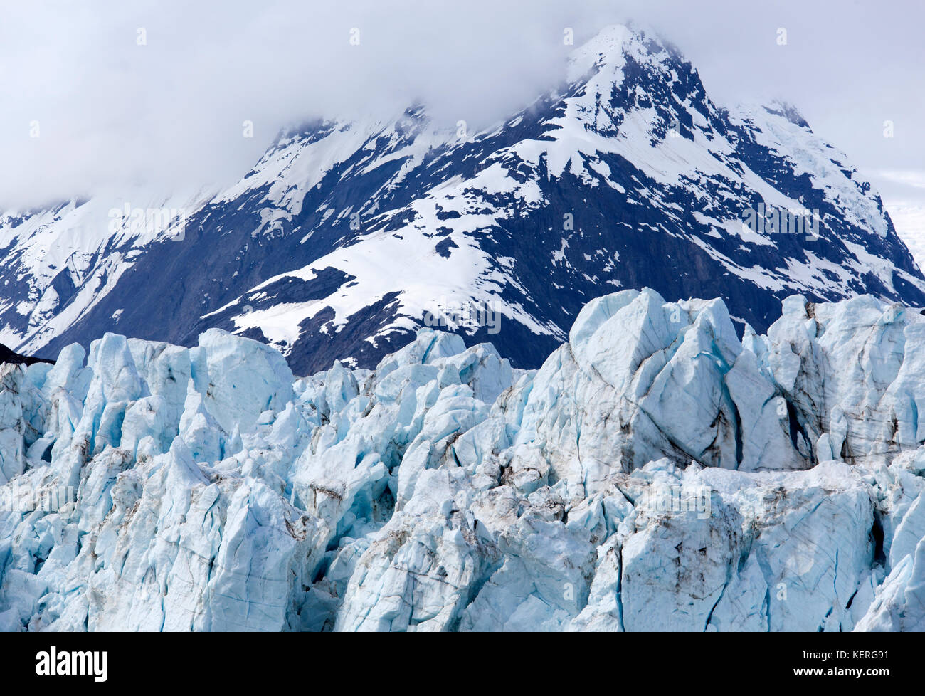 The glacier top view with a mountain in a background in Glacier Bay ...