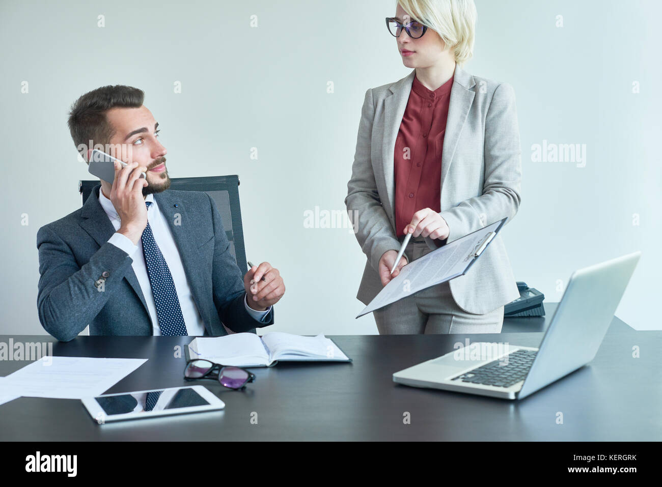 Busy Managers at Work Stock Photo - Alamy