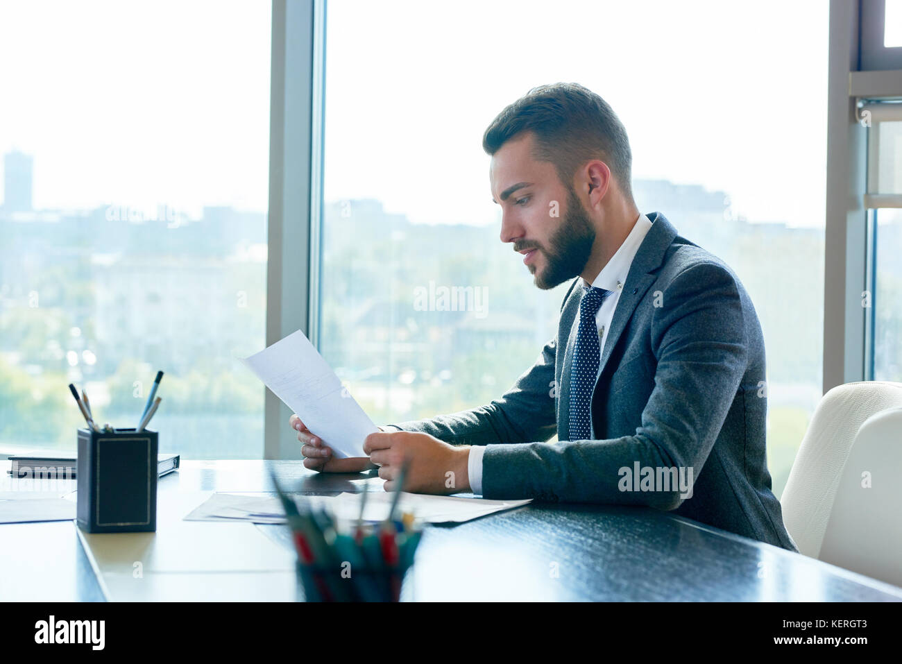 Wrapped up in Paperwork Stock Photo - Alamy