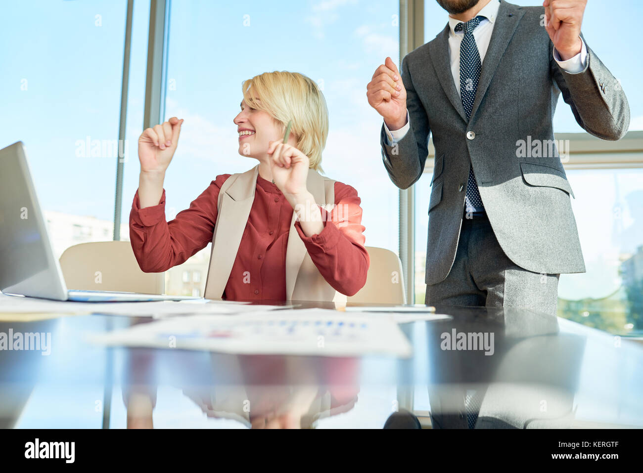 Successful businessman celebrating completion hi-res stock photography ...