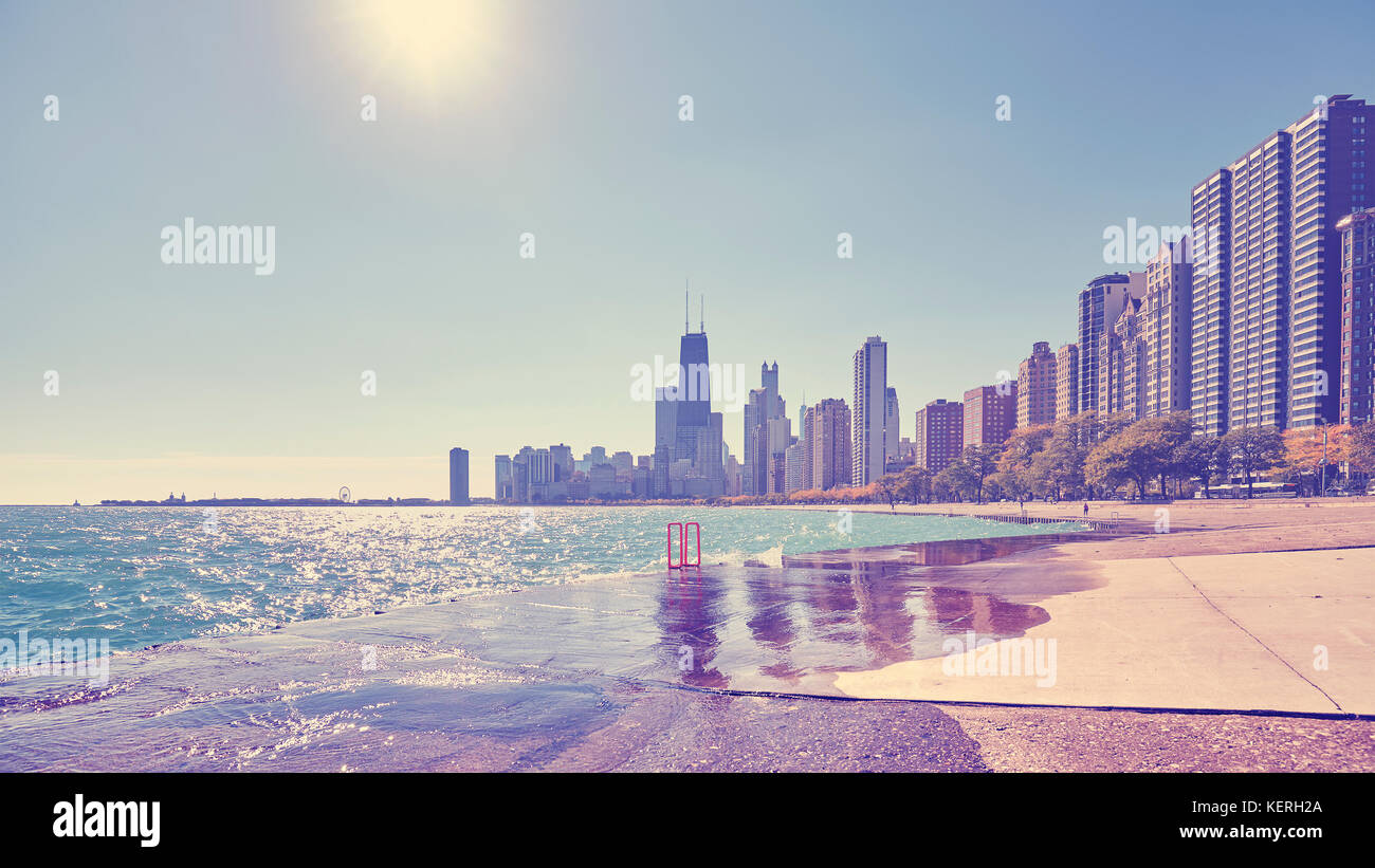 Vintage toned photo of Chicago city waterfront against the sun, USA ...