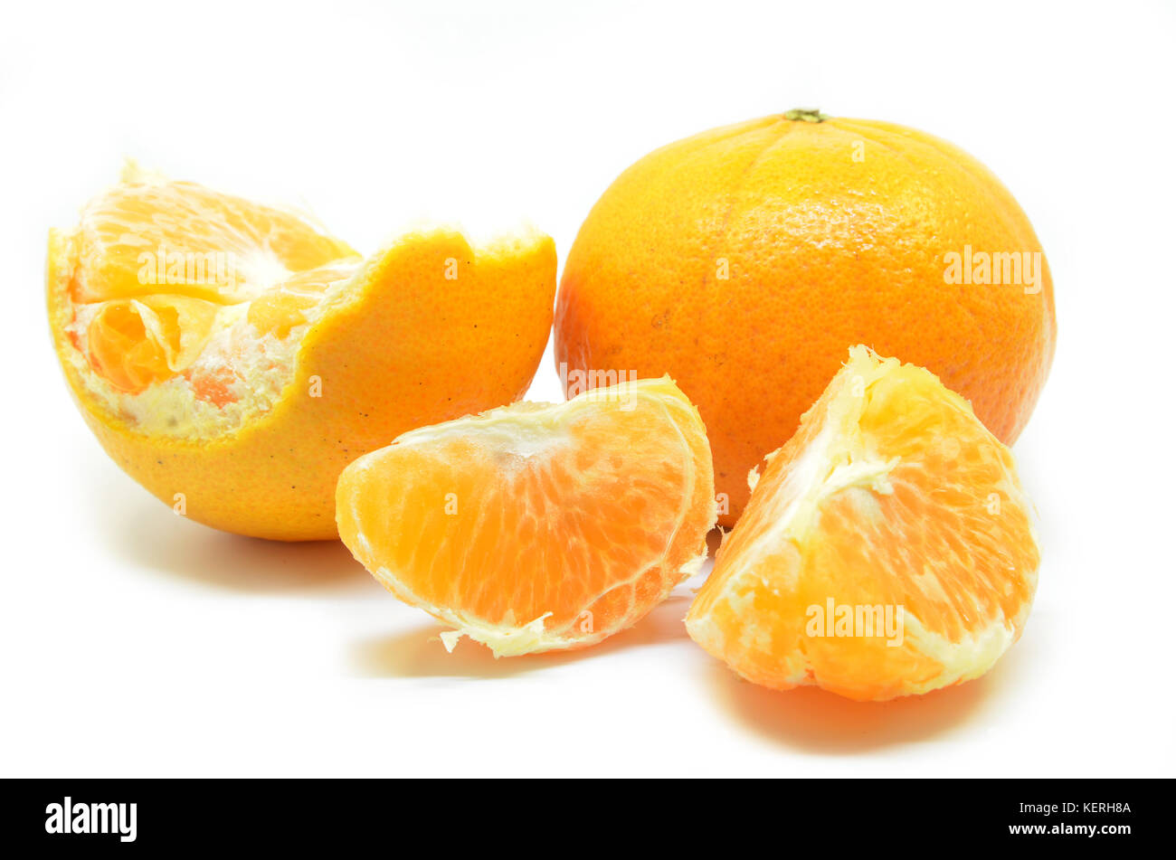 Mandarin oranges with segments, isolated on white background Stock ...