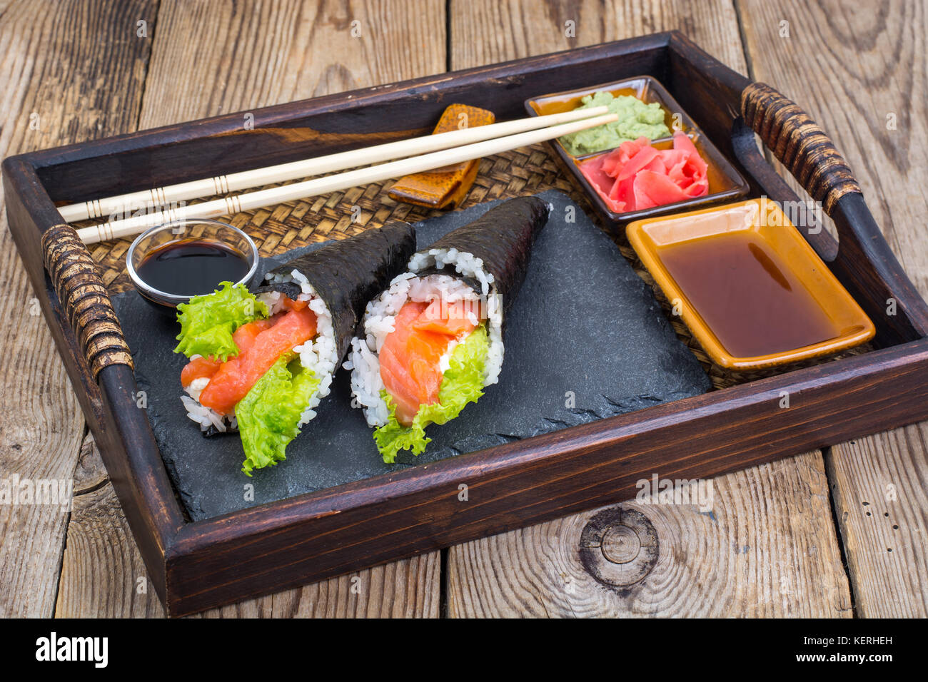 Salmon temaki sushi cone on the tray Stock Photo - Alamy