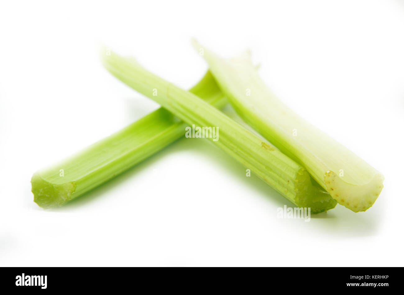 Fresh green celery isolated on white background Stock Photo - Alamy