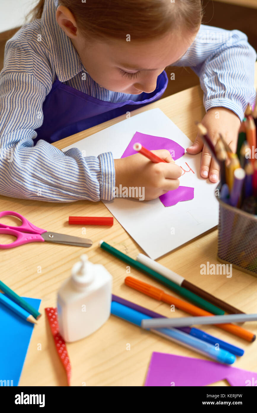 Cute Girl Making Handmade Card for Mom Stock Photo - Alamy