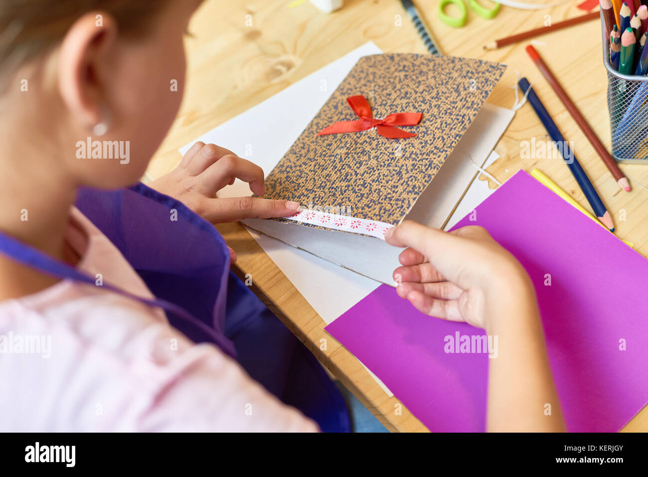 Girl Making Handmade Card for Mom Stock Photo - Alamy