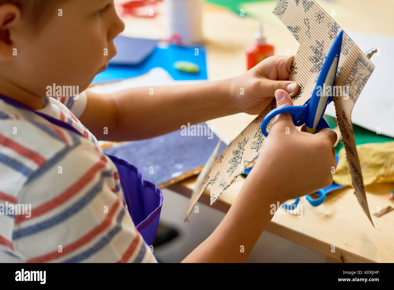 Cute Little Boy in Craft Class Stock Photo - Alamy