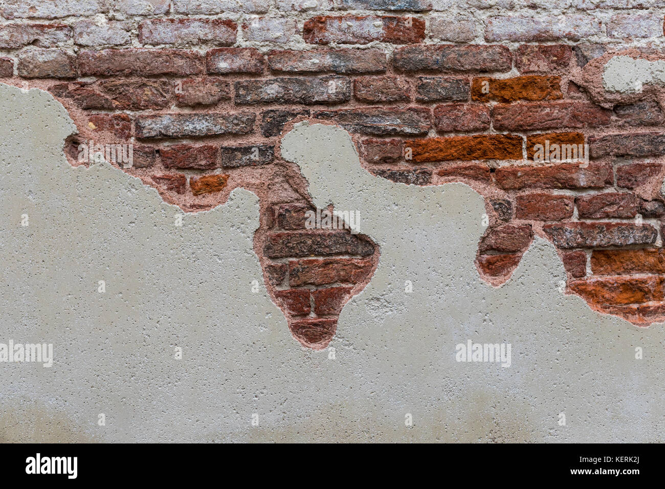 Brick Wall scrolling the street. Red Brick texture Stock Photo - Alamy
