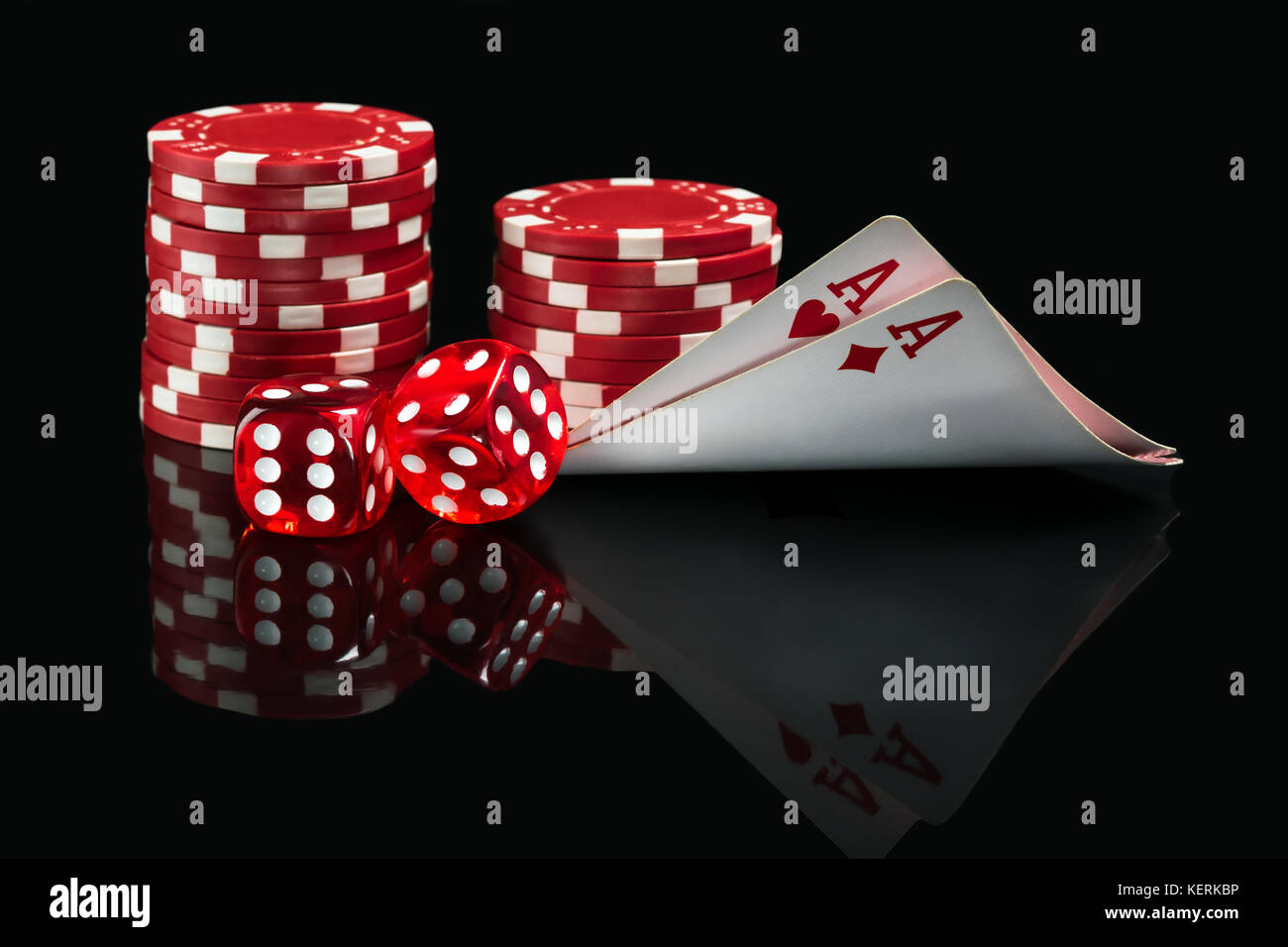 good combination of aces and dice in poker on a black background Stock ...