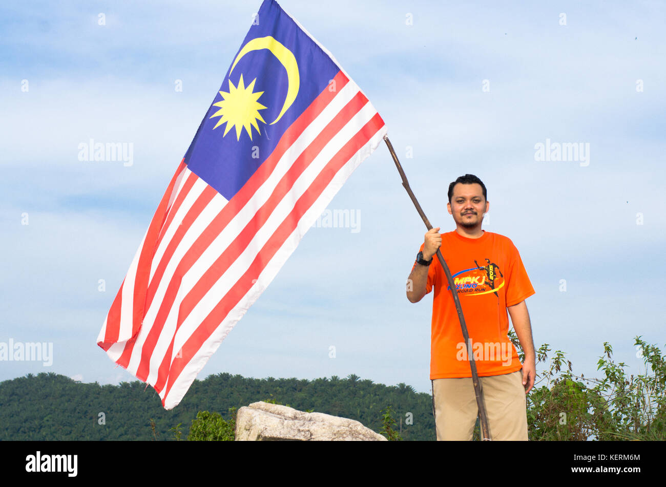 Man Holding Flag Stock Photo - Alamy