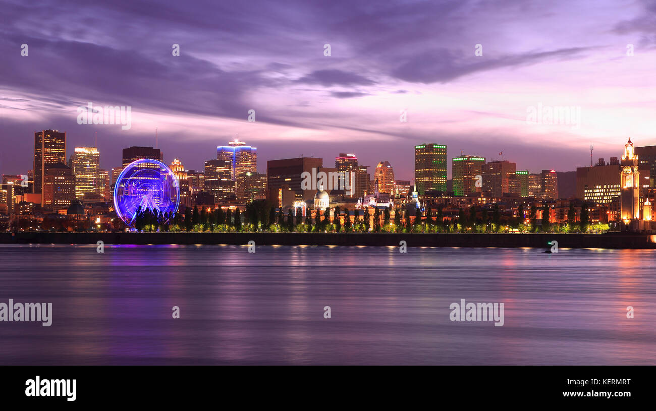 Montreal skyline and St Lawrence River illuminated at night, Quebec ...