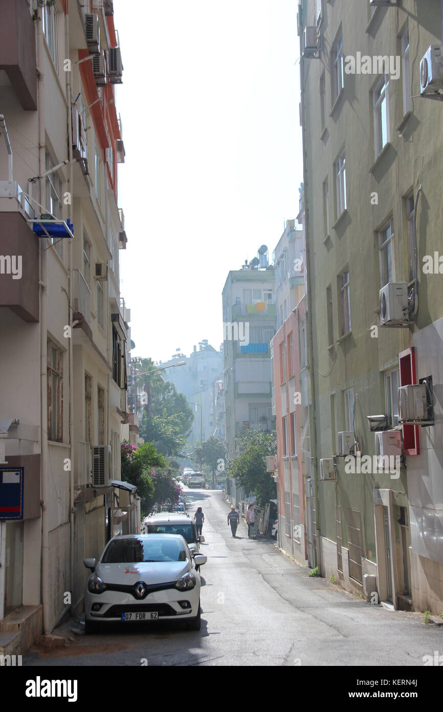 Turkish empty residential narrow street with typical concrete buildings ...