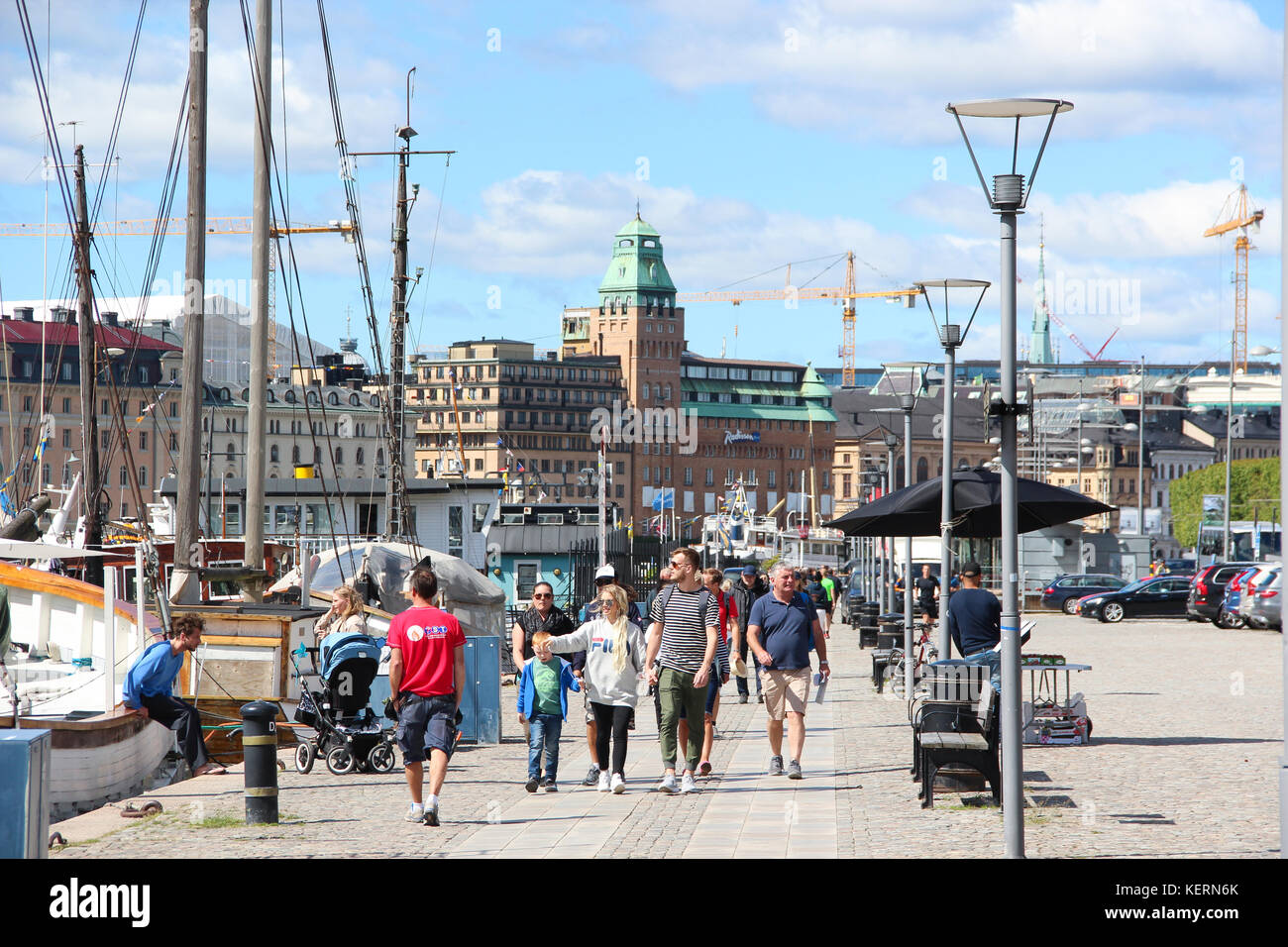 Views of the scenic waterfront in the city center with tourists and ...