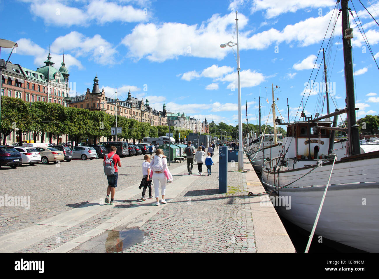 Views of the scenic waterfront in the city center with tourists and ...