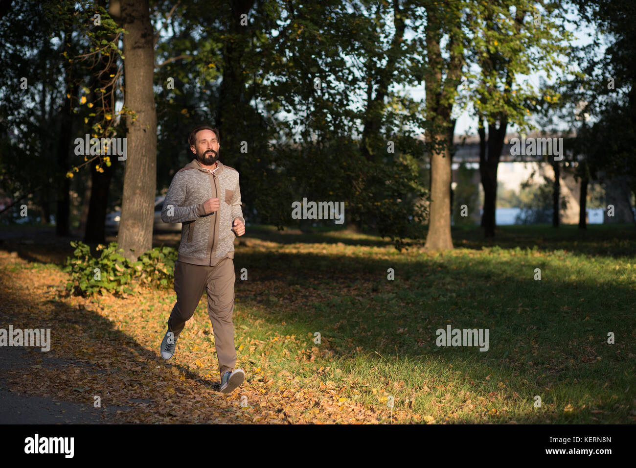 Healthy man running in the morning Stock Photo - Alamy